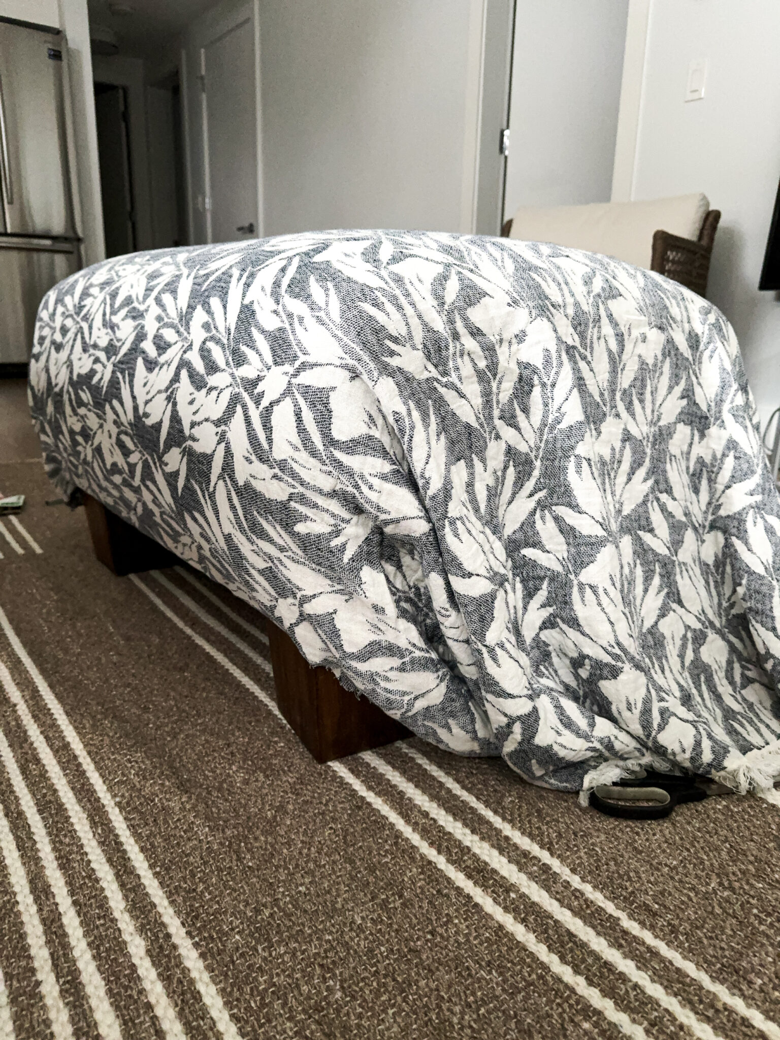 How to Reupholster an Ottoman With No Sewing Skills - Samantha Potter Home